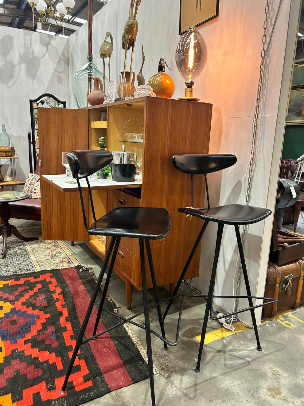Mid Century Wallace Bar Stools Pair vinyl and black metal frame – Esho Gallery